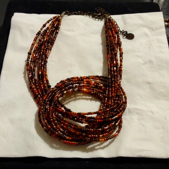 Jewelry | Assorted Tones Of Rust Beads That Are Looped In The Center ...